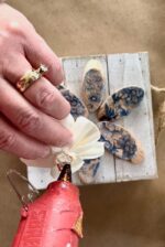 DIY Spring Decor: How to Make Wood Slice Spring Art - Perfecting Places